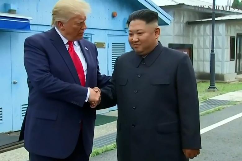 Trump and Kim to reopen talks after historic DMZ meeting | The Straits ...
