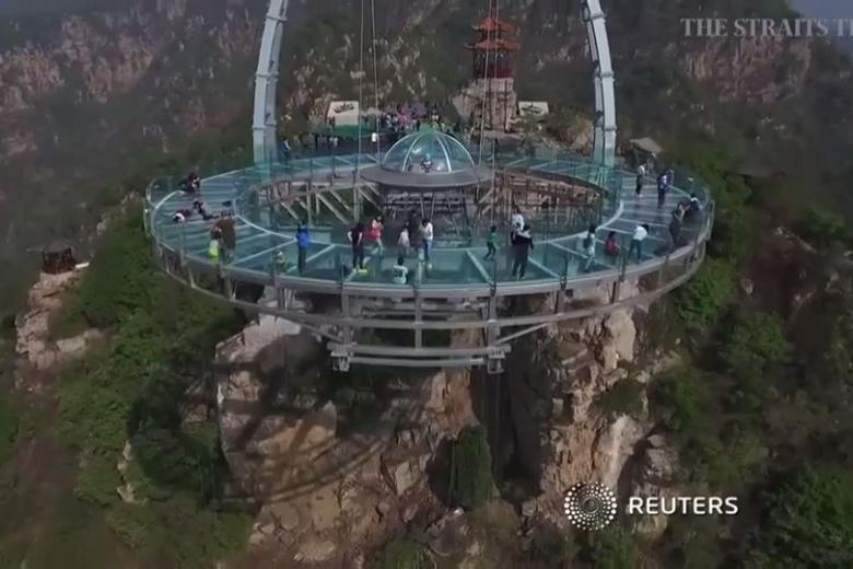 China's towering glass-bottom platform opens | The Straits Times