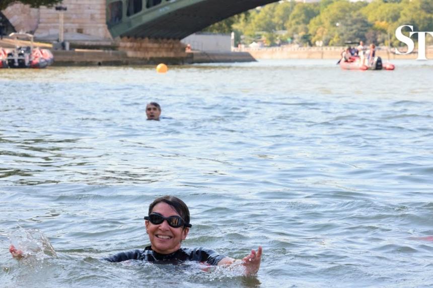 Paris mayor swims in Seine to show it’s safe for Olympic races | The ...