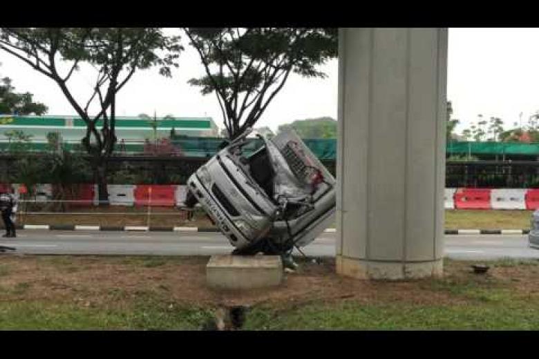Lorry driver injured after his vehicle hits pillar supporting MRT track ...