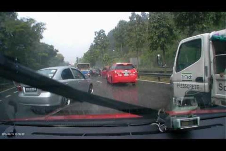 2 injured after blue Subaru crashes into lamp post on SLE | The Straits ...