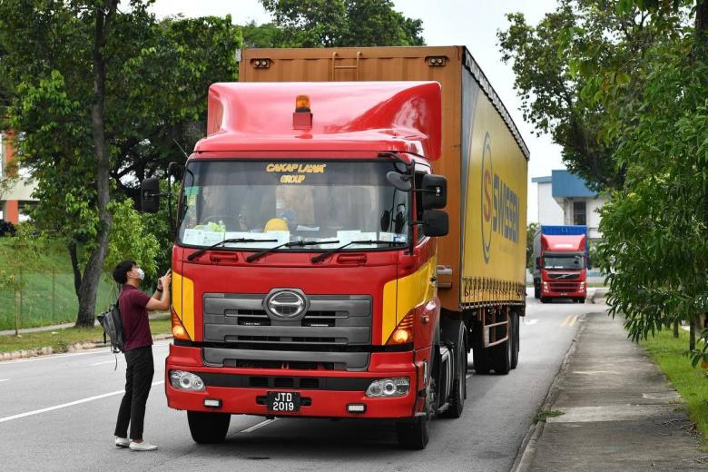 Cargo drivers from Malaysia vaccinated in S'pore against Covid-19 | The ...