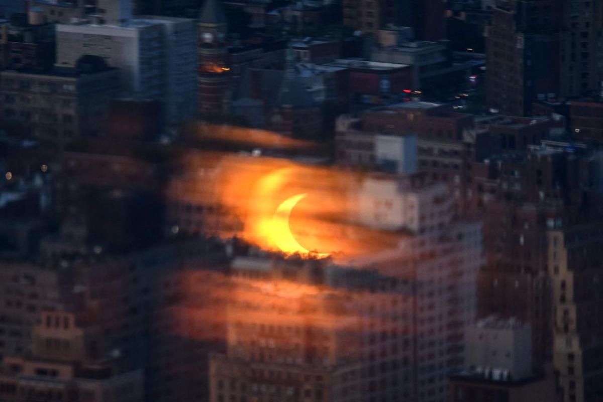 In Pictures: Annular 'ring of fire' solar eclipse visible in northern ...